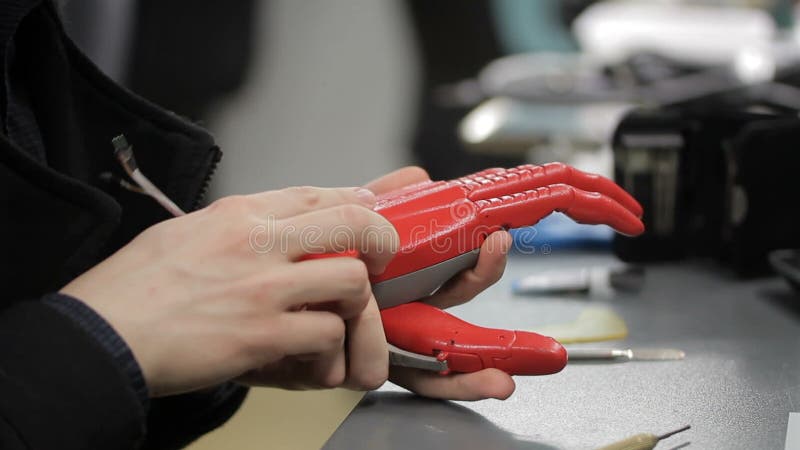 Close Up of Bionic Hand is Being Hold by the Professional. Stock ...