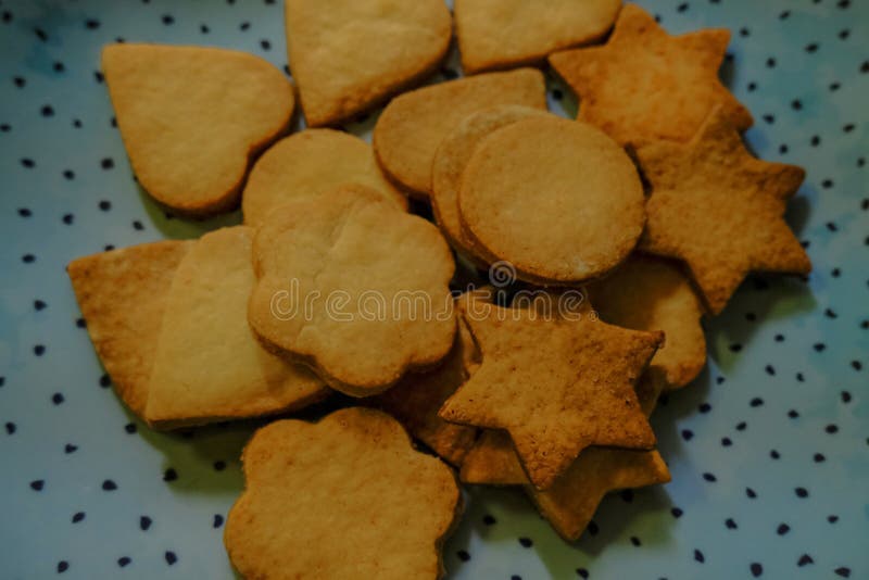 Close Up Biscuits Pastry of Different Shapes on Baking Paper in Oven ...