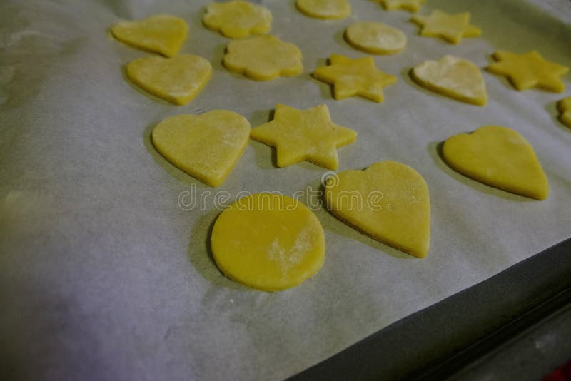 Close Up Biscuits Pastry of Different Shapes on Baking Paper in Oven ...