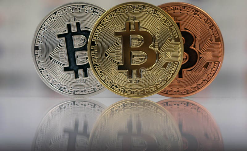 Close Up of Bitcoins, Gold Bitcoin, Silver Bitcoin and Bronze Bitcoin ...