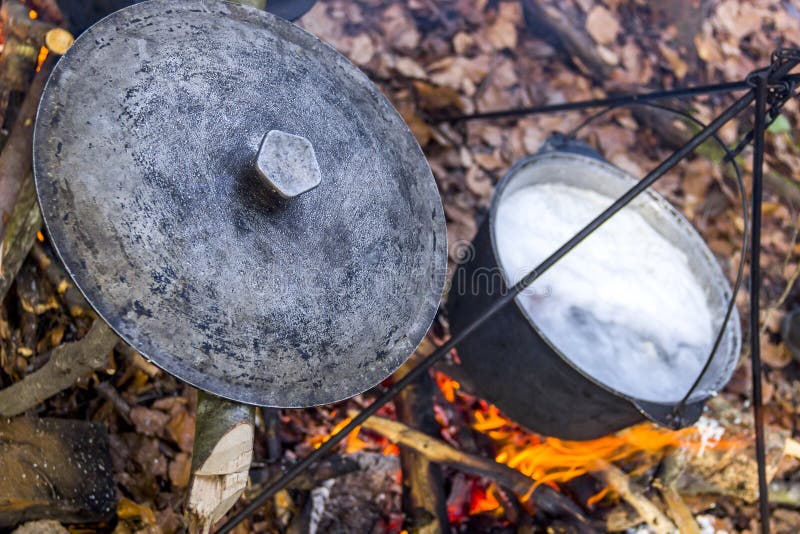 Cauldron on campfire stock image. Image of fire, closeup - 227865647
