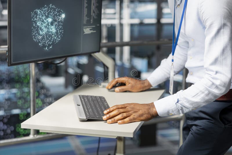 Close Up of Black Engineer Overseeing AI Code for Data Automation Stock Photo - Image of ...