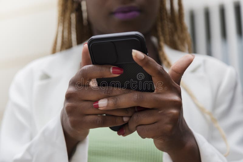 Close Up of Black Hands Using a Cellphone. Mobile Phone Addiction Stock ...