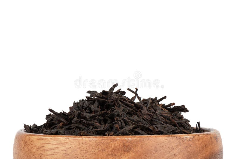 Close-up of Black Loose Leaf Tea on a White Background with Space for ...