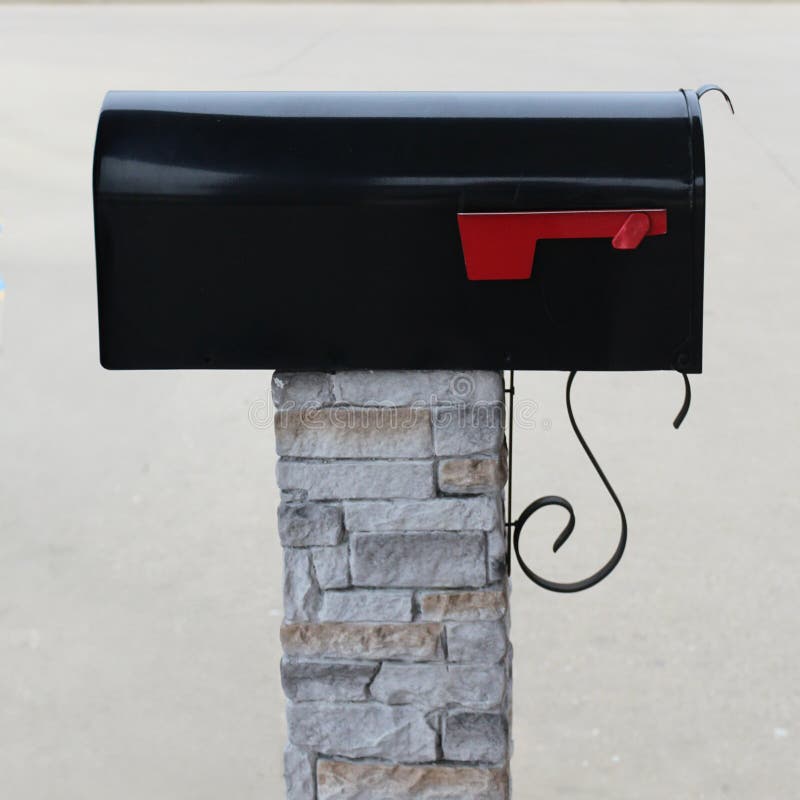 Close-up of a Black Mailbox with Red Flag on Stone Tile Base Isolated ...