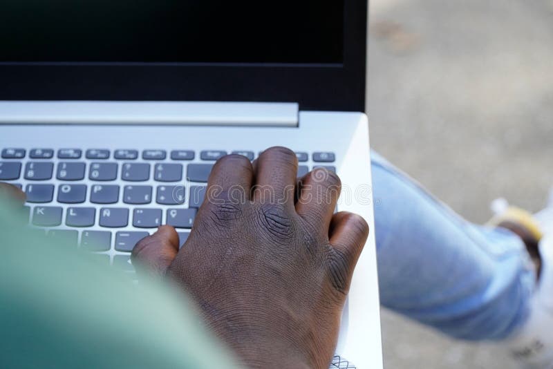 Close Up of Black Man Working with a Laptop Stock Image - Image of ...