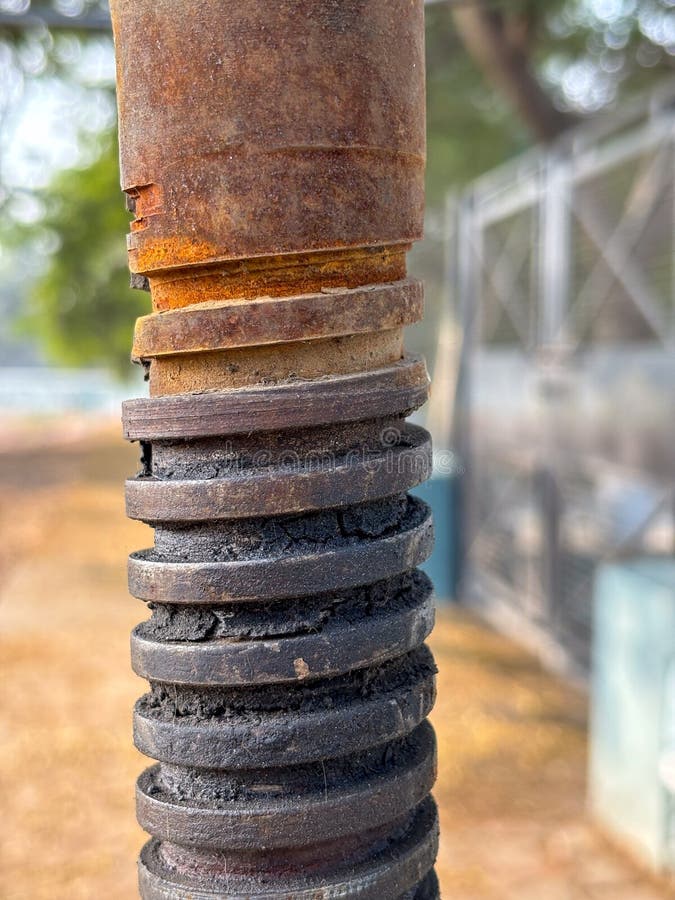 Close-up of a Black Metal Spring on Aged Metal Equipment Stock Photo ...