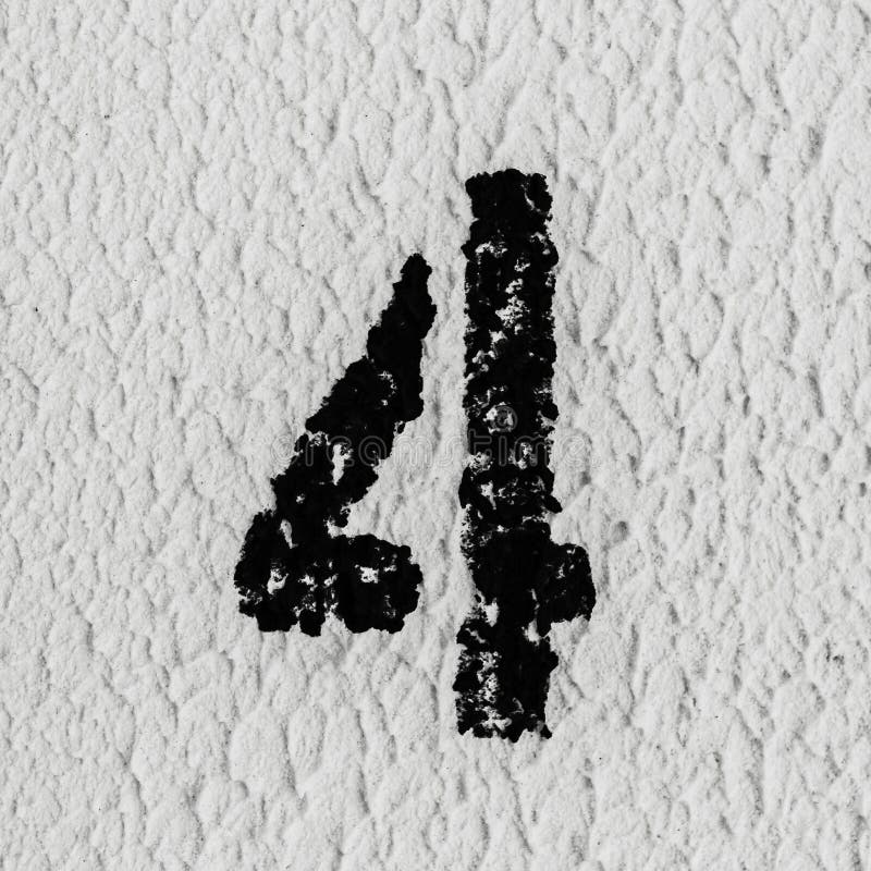 Close-up of Black Painted Number of 4 on the Grey Textured Wall. Stock ...