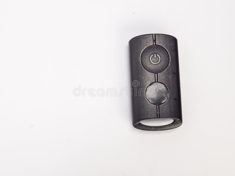 Close-up of a Black Remote Control with Power Button on White ...