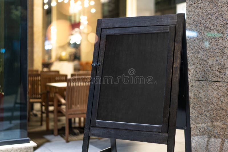 Close Up of Black Sandwich Board Next To Restaurant. Stock Image ...