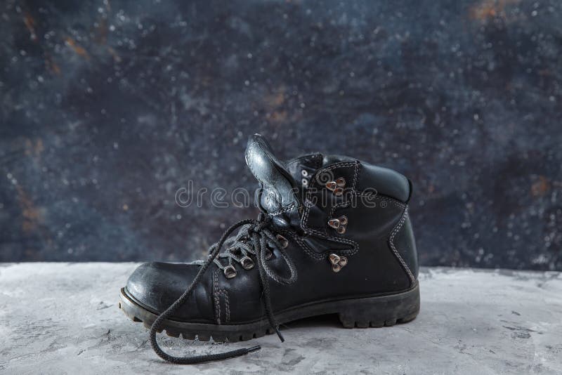 Close Up of a Black Shoe Boot on a Craft Material Surface Stock Image ...