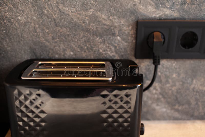 Close-up of Black Toaster Connected To Socket Stock Image - Image of ...