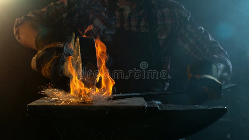 Close-up of Blacksmith Forging Glowing Hot Iron Stock Image - Image of ...
