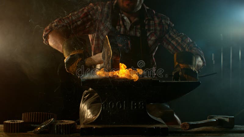 Close-up of Blacksmith Forging Glowing Hot Iron Stock Image - Image of ...