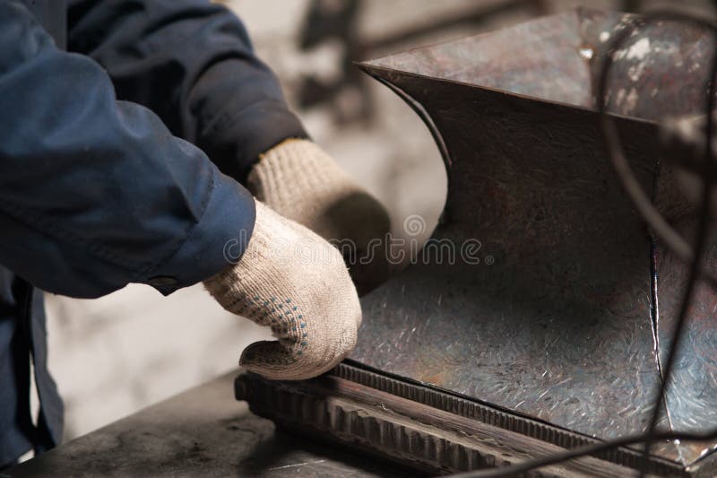 Close Up of Blacksmith Hands and a Metal Plate Stock Photo - Image of ...