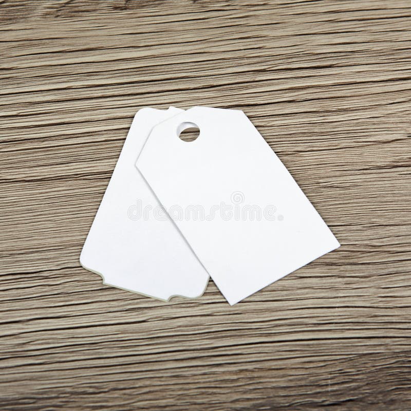 Close Up of Blank Paper Tags on Wooden Surface. Stock Image - Image of ...