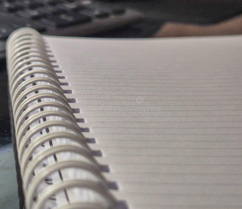 Close-up of a Blank Spiral Notebook Showing Its Spiral Binding and ...