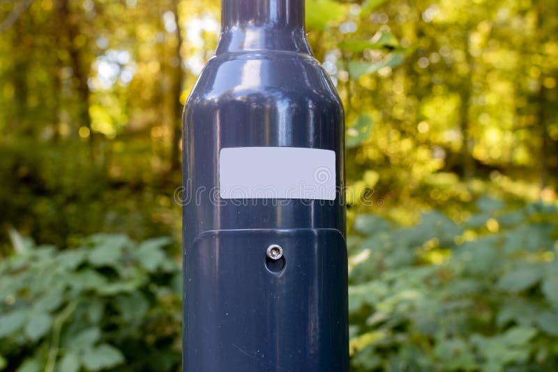 Close Up of a Blank White Sticker on Metallic Light Post Stock Photo ...