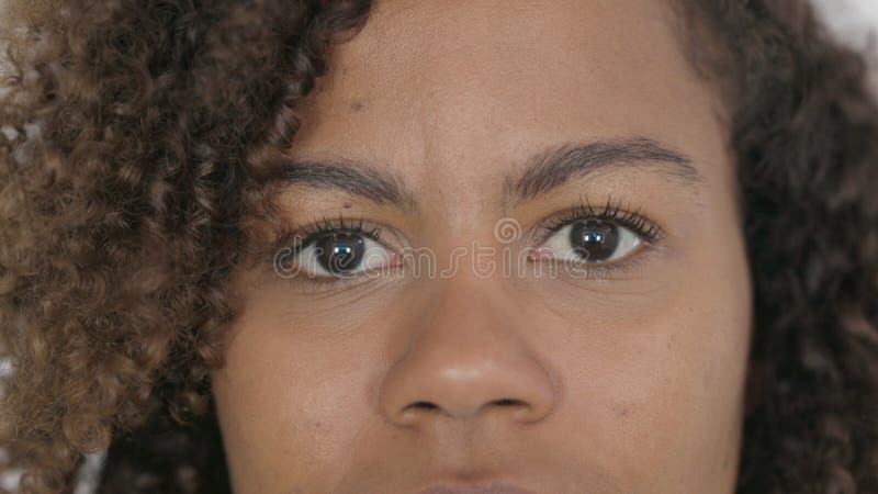 Close Up of Blinking Eyes of African Woman Stock Image - Image of busy ...