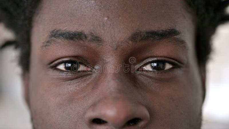 Close Up of Blinking Eyes of African Man Stock Image - Image of looking ...