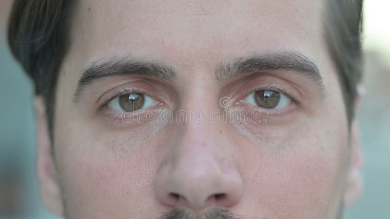 Close Up of Blinking Eyes of Man Looking at Camera Stock Video - Video ...