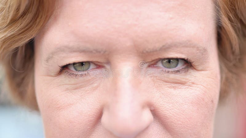 The Close Up of Blinking Eyes of Old Woman Stock Image - Image of ...
