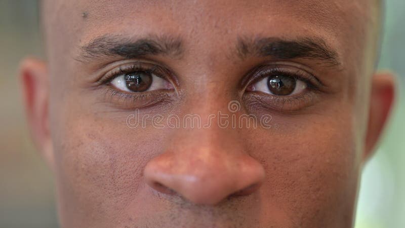 Close Up of Blinking Eyes of Young African Man Stock Image - Image of ...