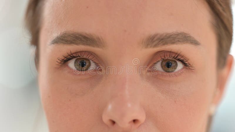 Close Up of Blinking Eyes of Young Woman Stock Photo - Image of winking ...