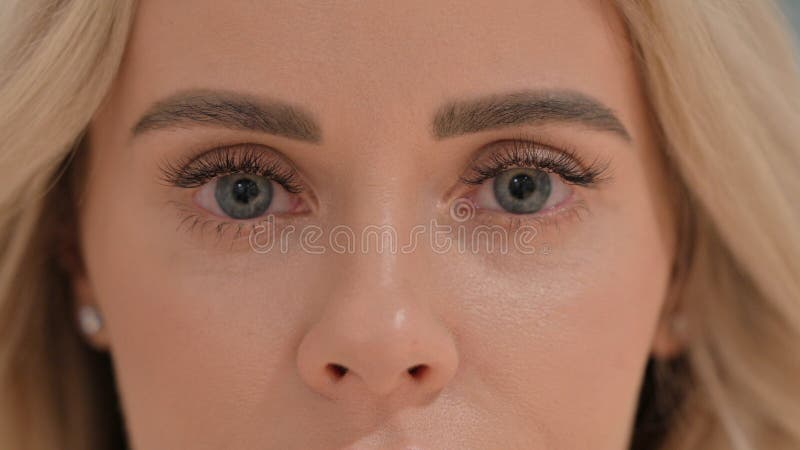 Close Up, Blinking Eyes of Young Woman Looking at Camera Stock Image ...