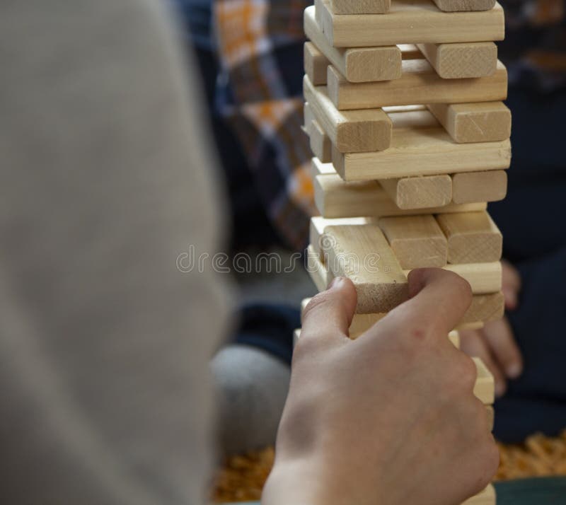 Close Up Blocks Wood Game Hand Holding Block Stock Image - Image of ...