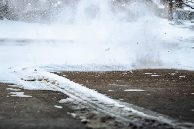 Close-up of Blowing Snow on Pavement Driveway Full Frame Abstract ...