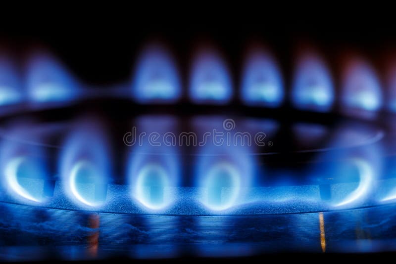 Close Up Blue Flame of the Gas Burner of the Kitchen Stove in the Dark ...