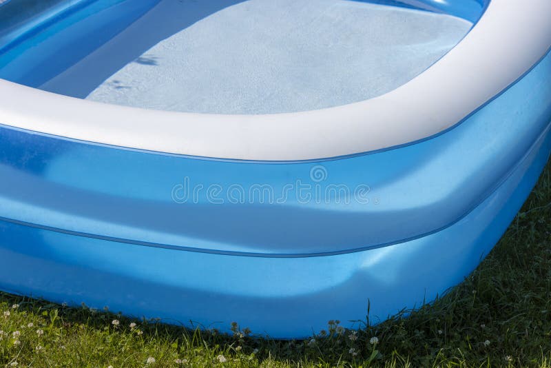 Close-up of a Blue Inflatable Pool Filled with Clean Cool Water Stands ...