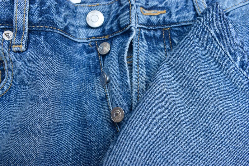 Close Up of Blue Jean Steel Button and Zip Fabric Texture Background ...