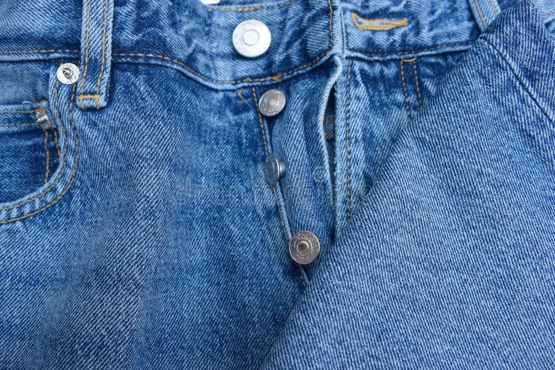 Close Up of Blue Jean Steel Button and Zip Fabric Texture Background ...