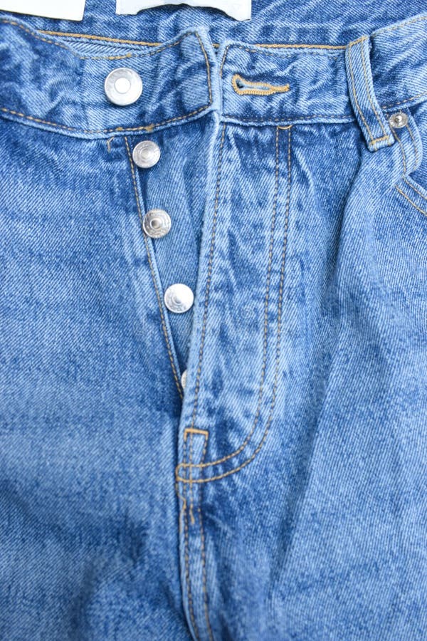 Close Up of Blue Jean Steel Button and Zip Fabric Texture Background ...