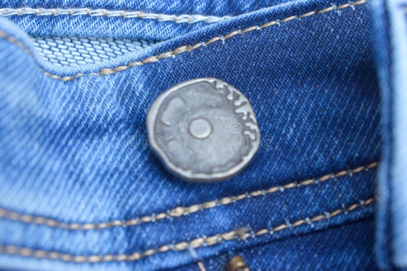 Close Up of Blue Jean Steel Button and Zip Fabric Texture Background ...