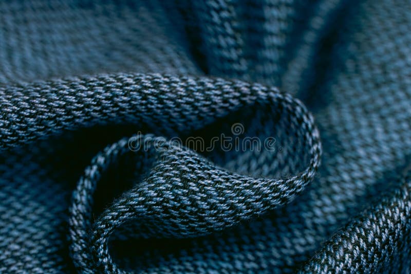 Close-up of Blue Knitted Fabric with a Loop Knot, Highlighting Thread ...
