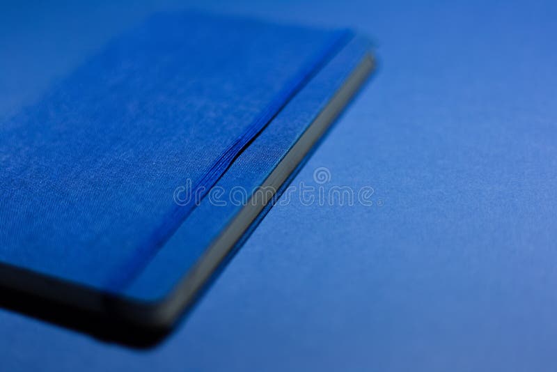 Close-up of Blue Notebook on Blue Background. Stock Photo - Image of ...