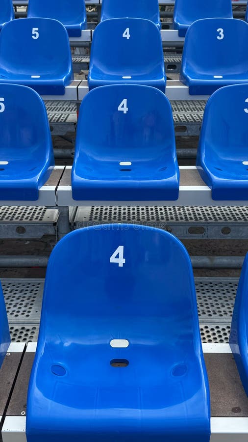 Close-up of Blue Numbered Stadium Seats Stock Photo - Image of blank ...
