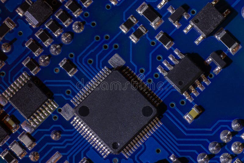 Close-up of a Blue Printed Circuit Board PCB with Stripes of Conductors ...