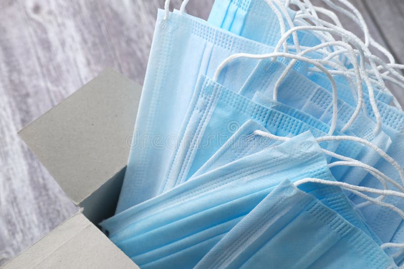 Close Up of Blue Surgical Masks on Table Stock Image - Image of ...