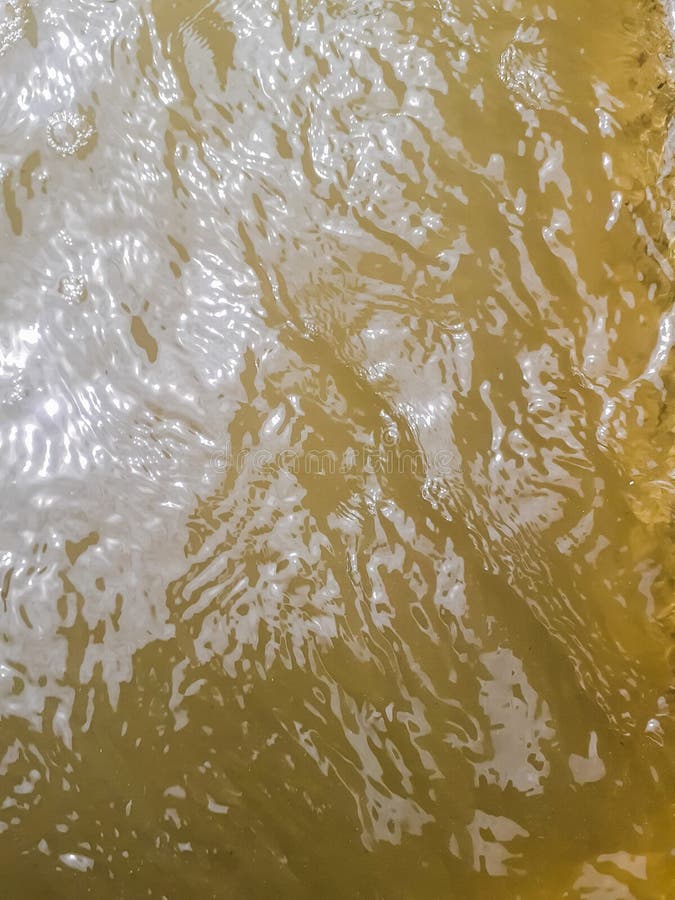 Close Up Blurred Blowing Water with White Foam in Sun Light Editorial ...