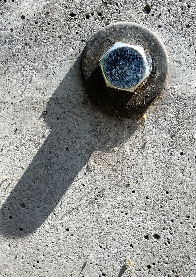 Close Up of Bolt Fastener with Washers on Concrete Surface Stock Image ...
