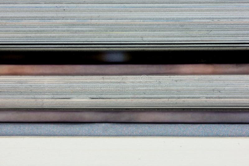 Close-up of a the Book Edge of Three Colored Books Stock Photo - Image ...