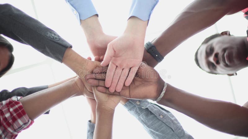 Close Up Bottom View of People Putting Their Hands Together. Stock ...