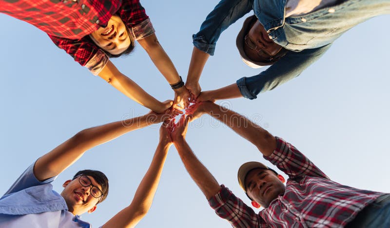 Close Up Bottom View of People Putting Their Hands Together. Friends ...