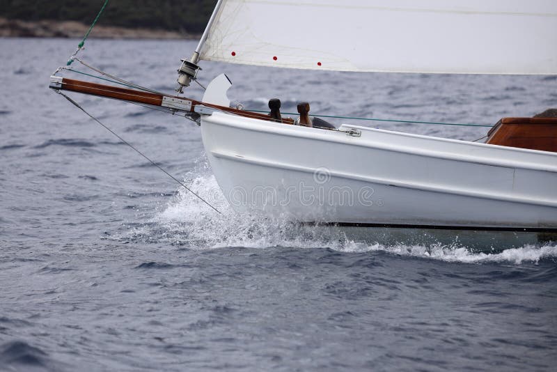 Close Up on the Bow of a Sailboat Breaking through a Wave Stock Image ...