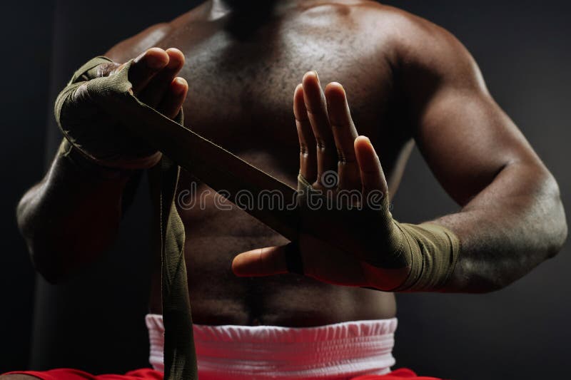 Close Up of Boxer Putting on Hand Wraps Stock Photo - Image of bare ...