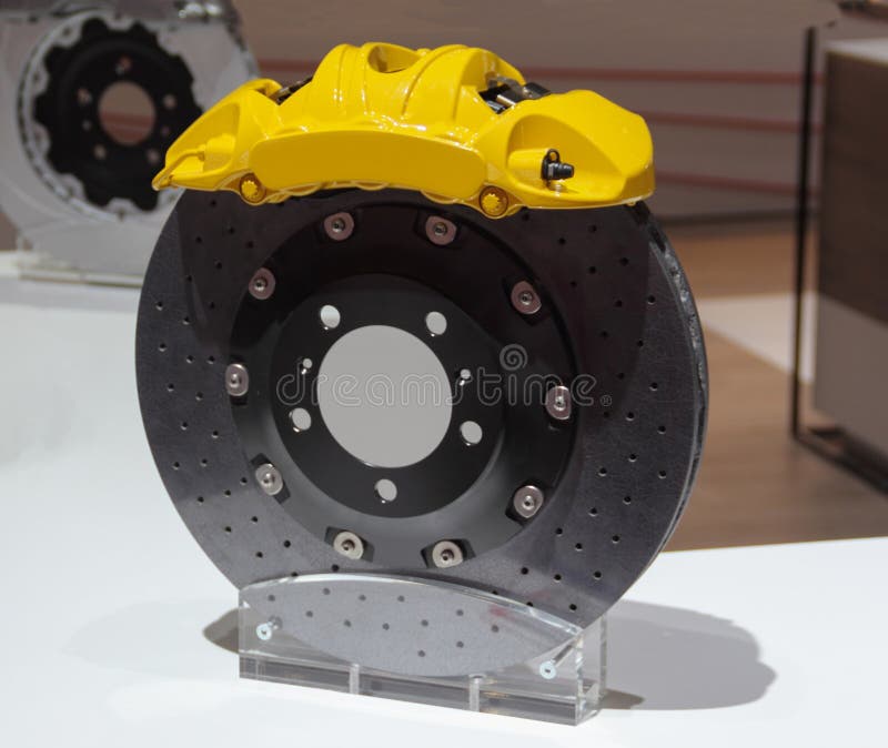The Close Up of Brake System with Yellow Caliper Cover Editorial Photo ...